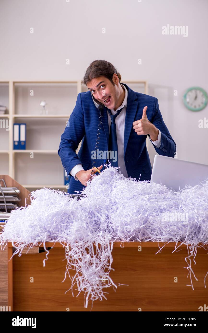 Paper shredder employee hi-res stock photography and images - Alamy