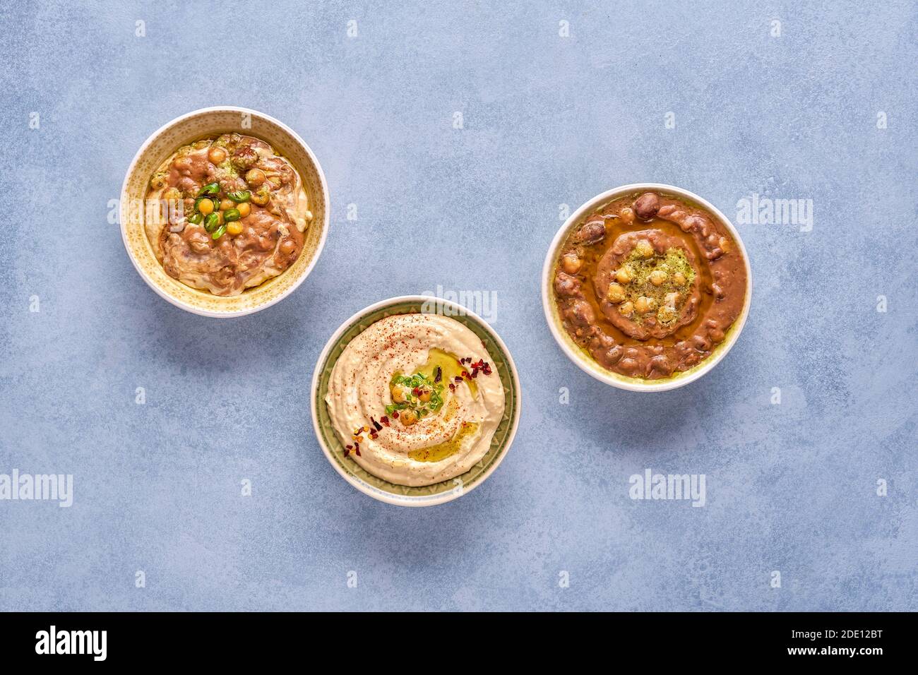 Middle eastern, arabic traditional chickpea dishes hummus, foul, and ...