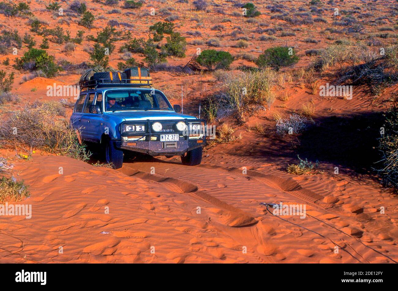 Tackling sand dunes in the Simpson Desert, Central Australia Stock ...