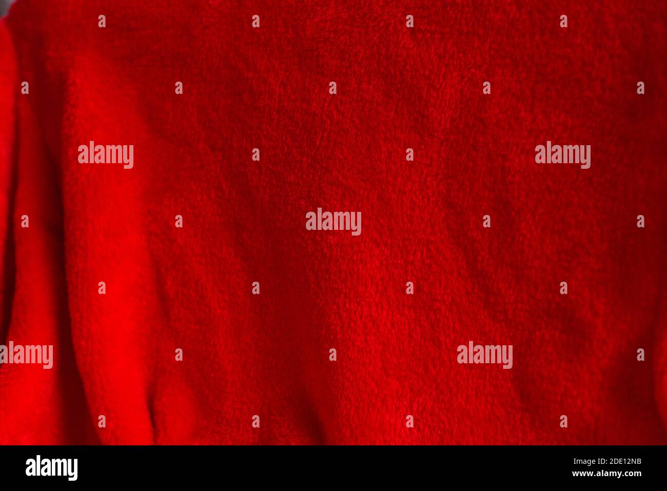 Shiny red textile background.Red fleece. The red cloth is warm Stock ...