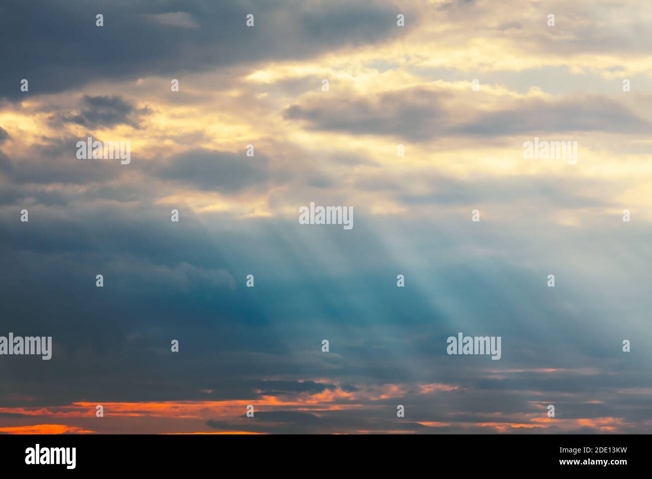 Diagonal sun rays in the dawn Stock Photo - Alamy