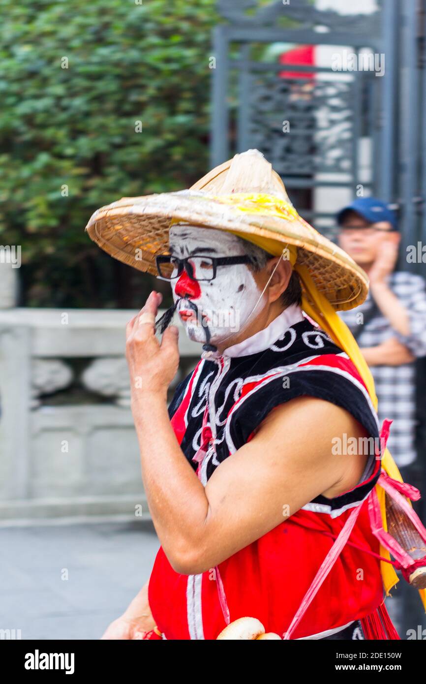 A religious parade during the Bao Sheng Cultural Festival that ...