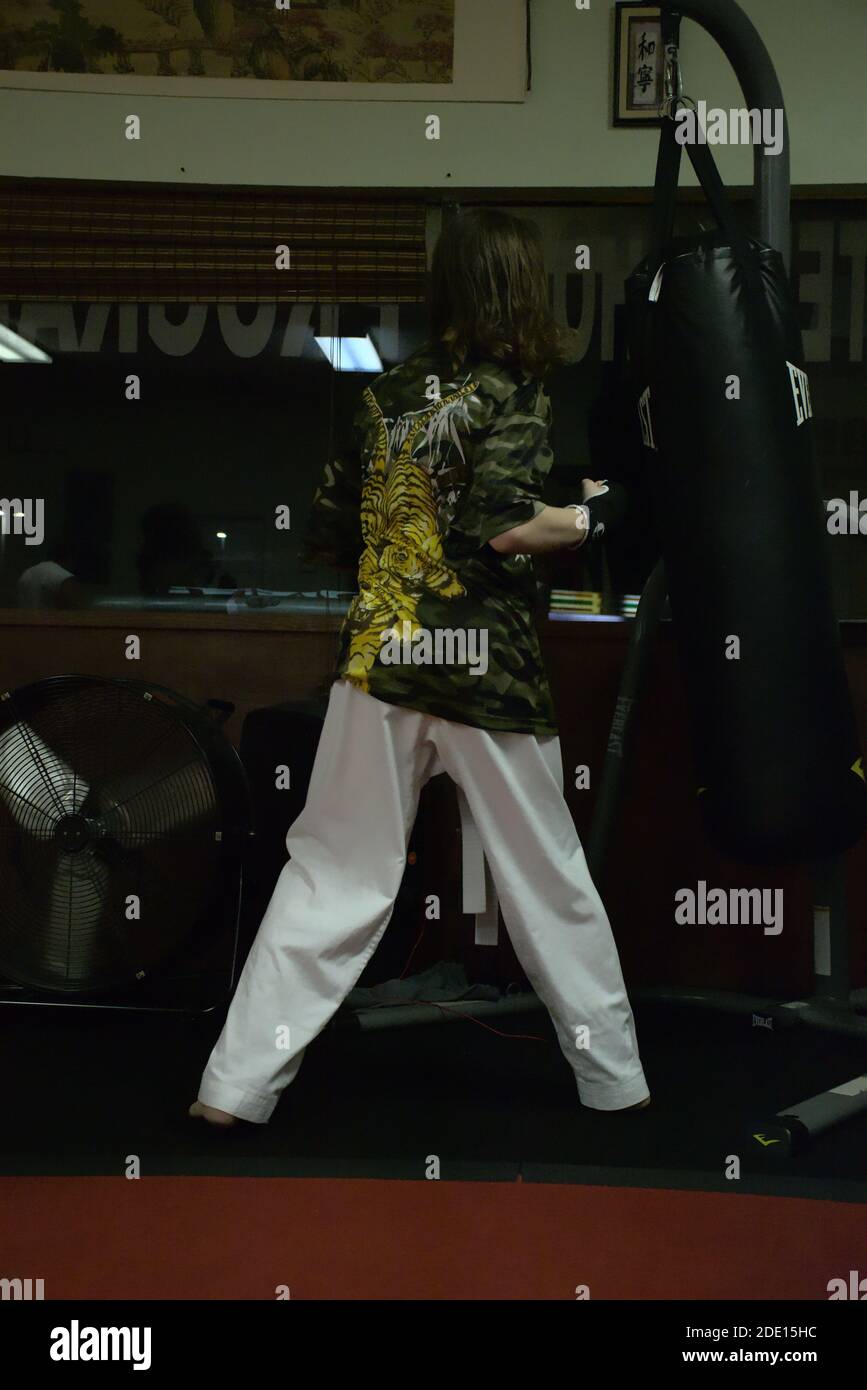 This action photo is of my daughter and son in Karate class. Karate is ...