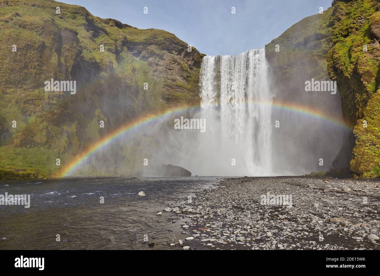 A permanent rainbow in waterfall spray, Skogafoss Falls, near Vik ...