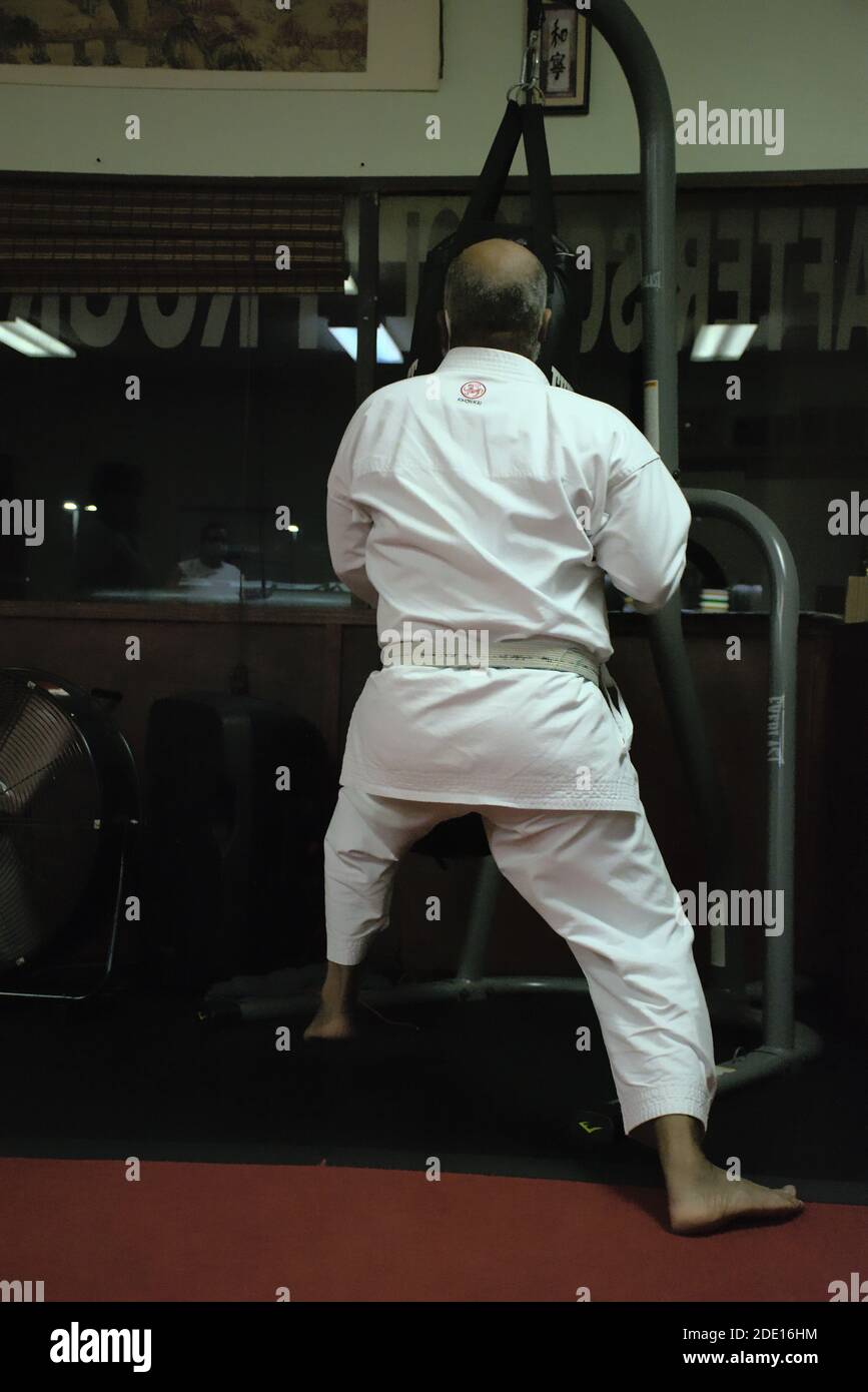 This action photo is of my daughter's Karate class. Karate is a martial ...