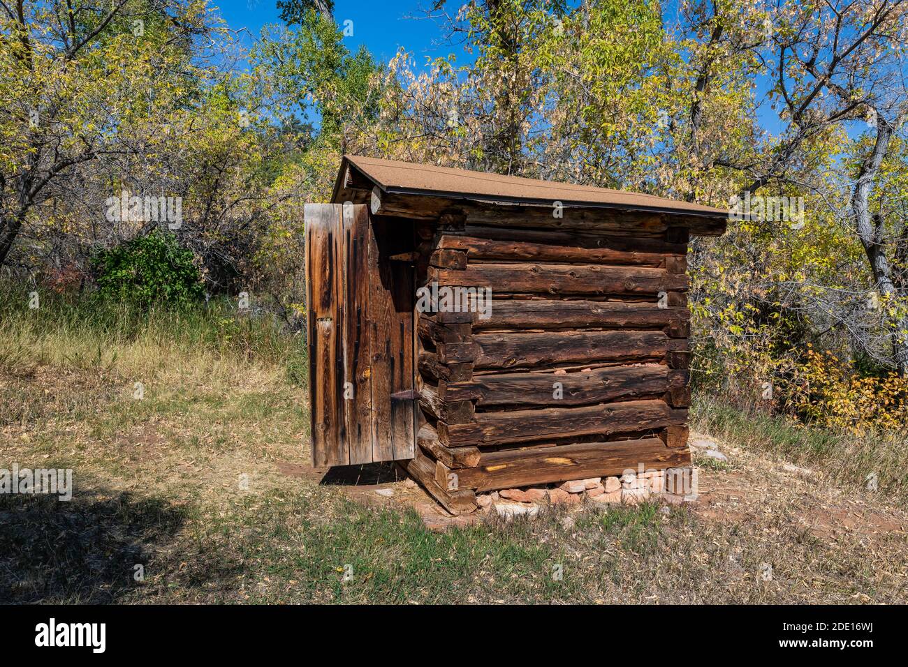 Log outhouse at Caroline Lockhart Historic Ranch Site in Bighorn Canyon ...