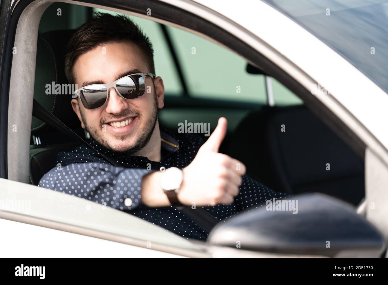 Happy male driver thumbs up hi-res stock photography and images - Alamy