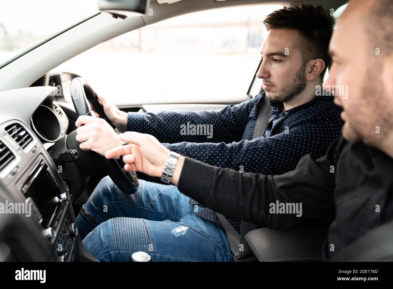 Driving Instructor and Man Student in Examination Car Testing Learner ...
