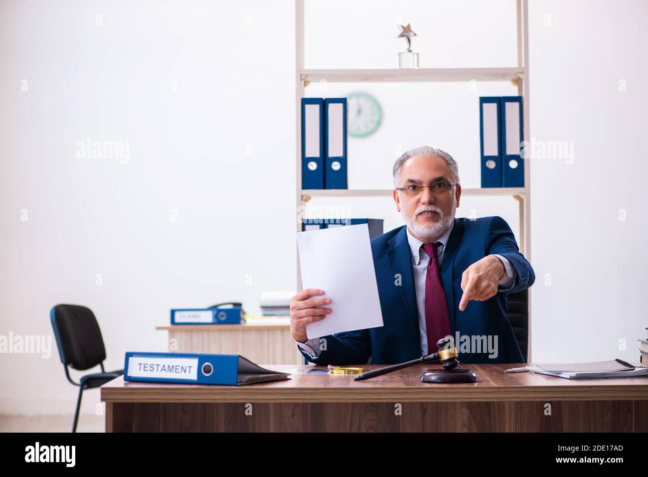 Experienced judge sitting in the office Stock Photo - Alamy