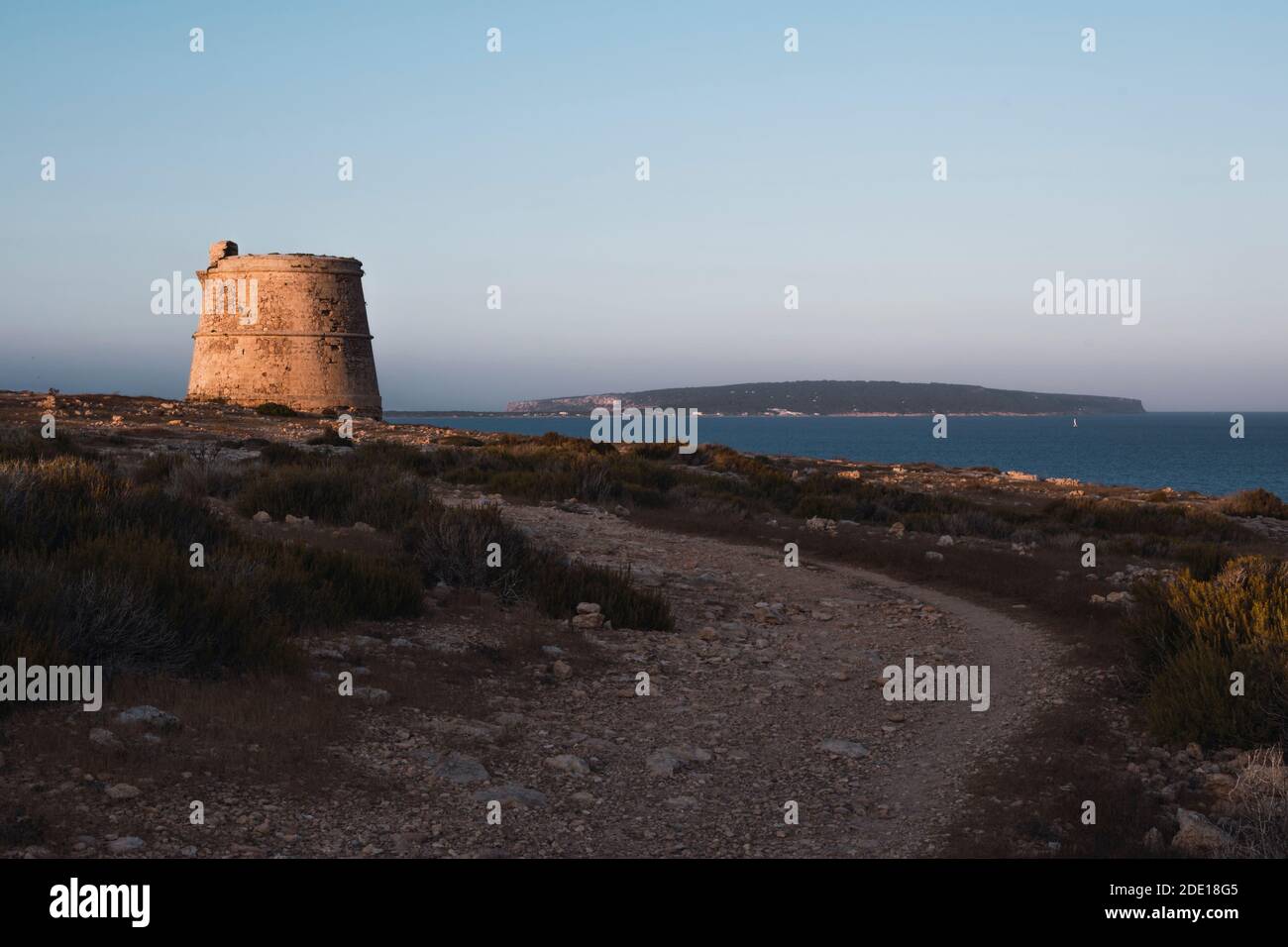 Torre del cap de Barbaria, in the distance Far del cap de Barbaria ...
