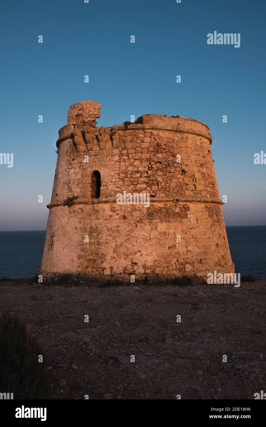 Torre del cap de Barbaria, in the distance Far del cap de Barbaria ...