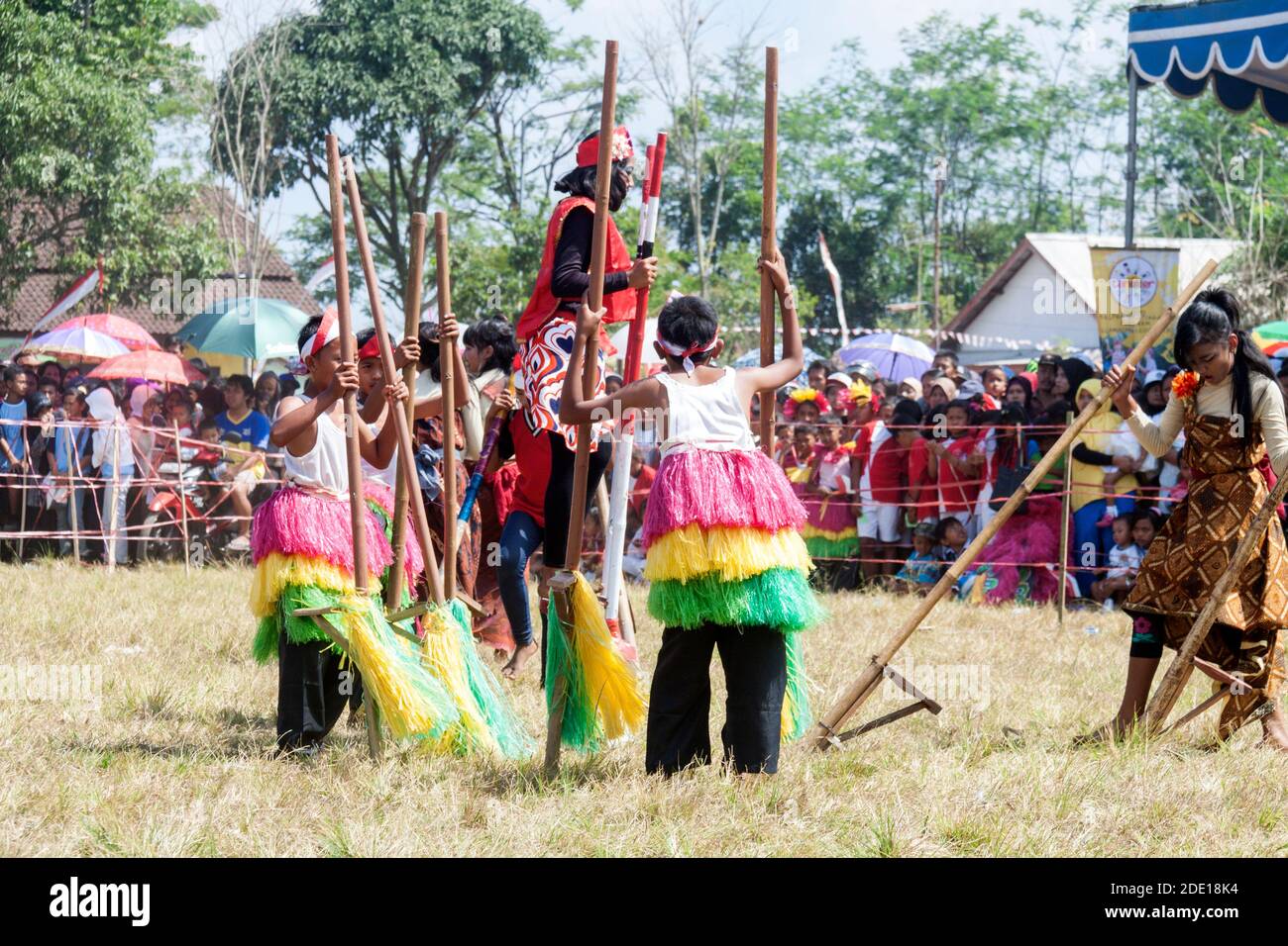 Participants of the annual stilts festival in Ledokombo village, Jember ...