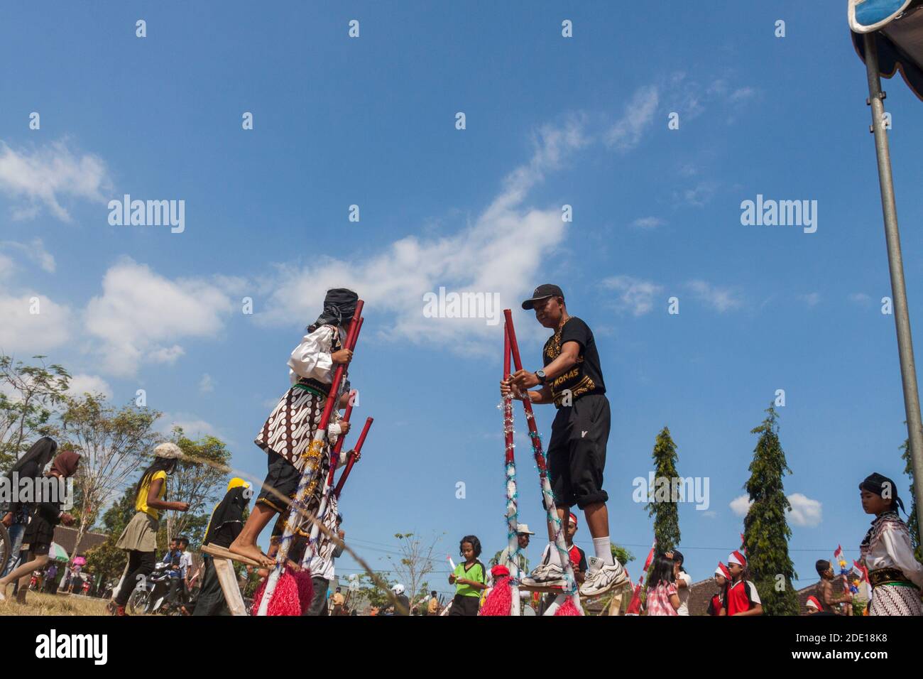 Participants of the annual stilts festival in Ledokombo village, Jember ...