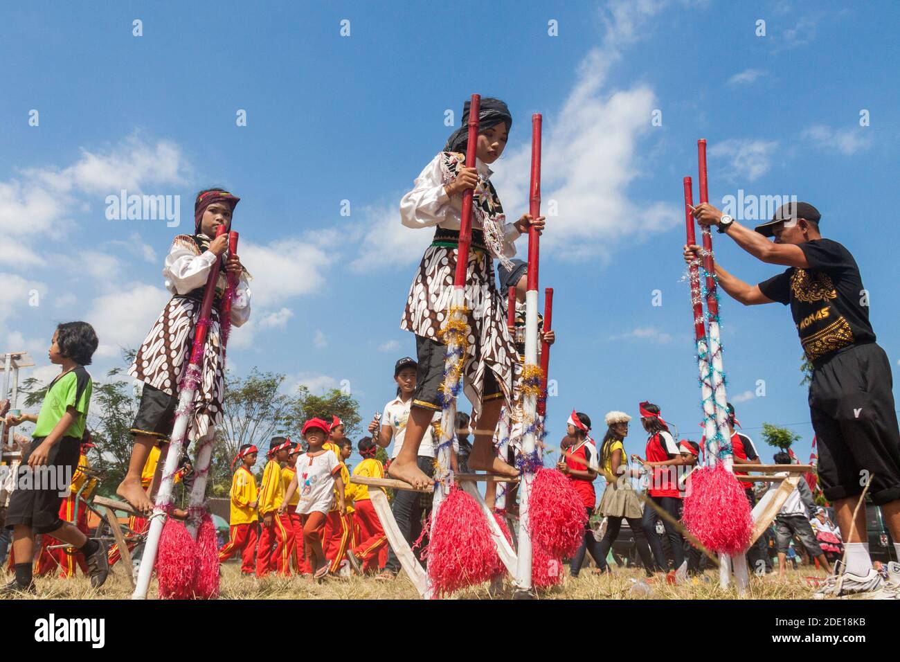 Participants of the annual stilts festival in Ledokombo village, Jember ...