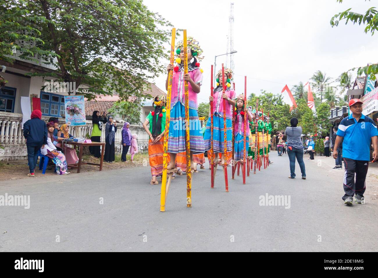 Participants of the annual stilts festival in Ledokombo village, Jember ...