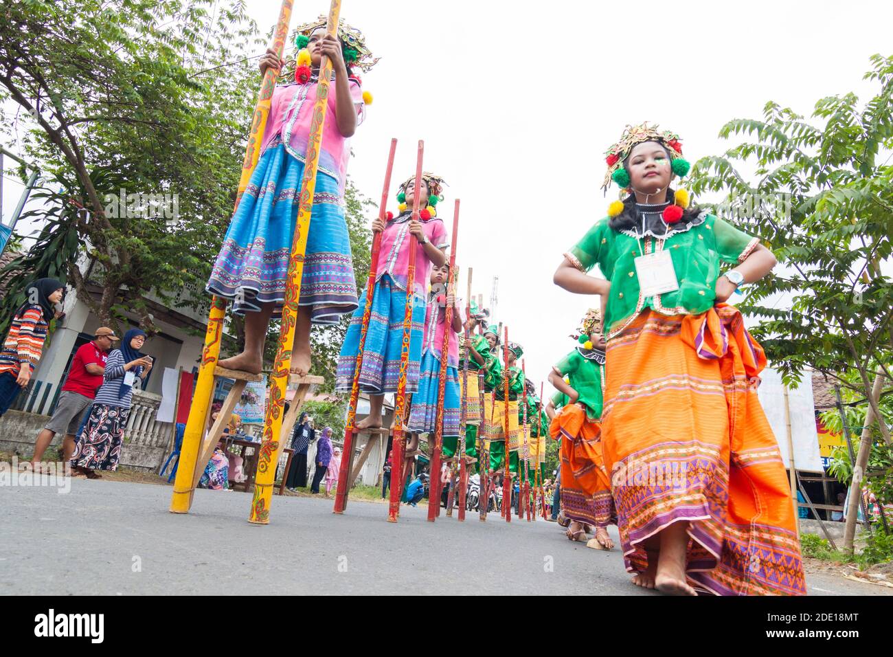Participants of the annual stilts festival in Ledokombo village, Jember ...