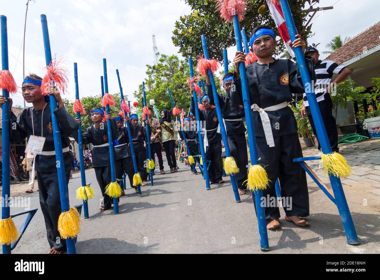Participants of the annual stilts festival in Ledokombo village, Jember ...