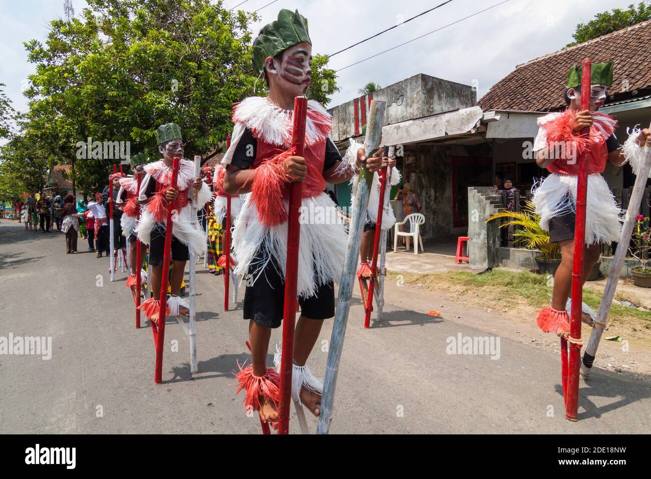 Participants of the annual stilts festival in Ledokombo village, Jember ...