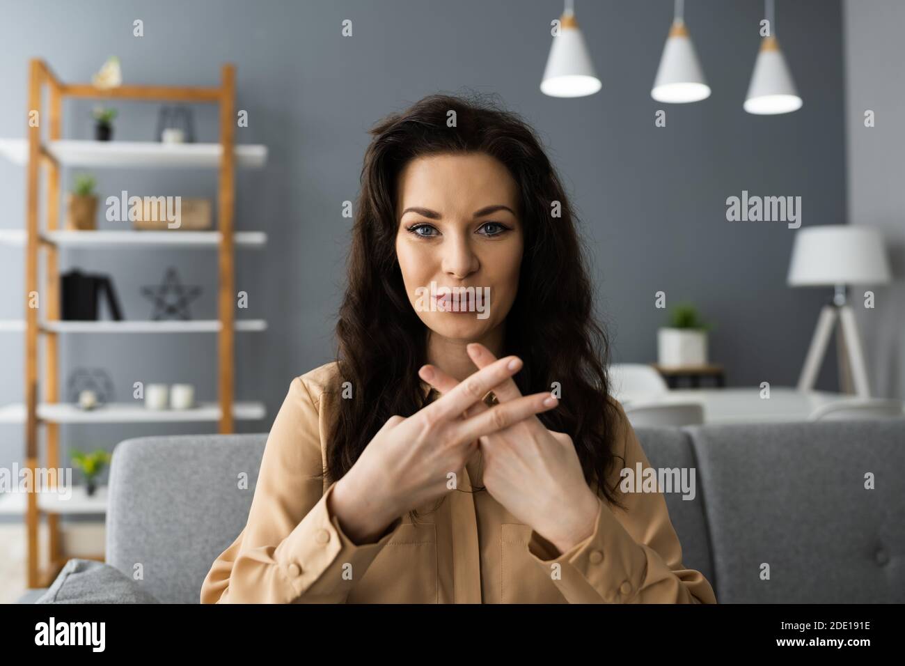 Adult Learning Sign Language For Deaf Disabled Stock Photo - Alamy