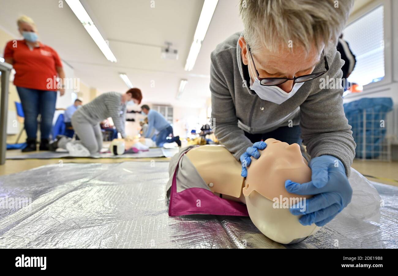 Offered doll hi-res stock photography and images - Alamy