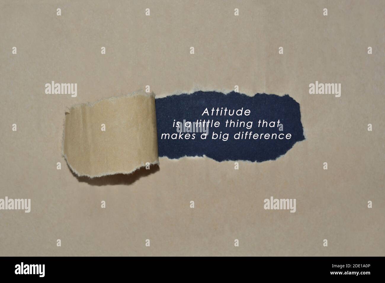 Motivational quote written on brown torn paper - Motivational concept ...