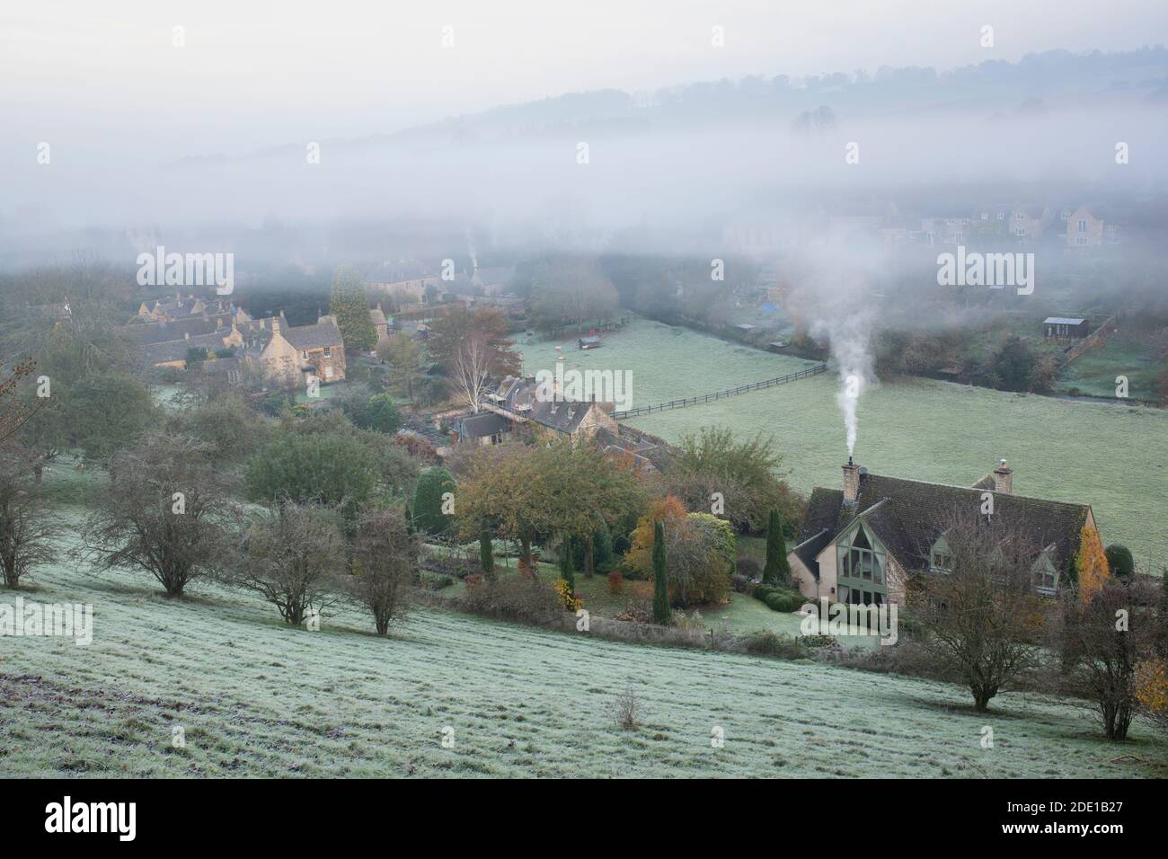 Fog over cotswold village hi-res stock photography and images - Alamy