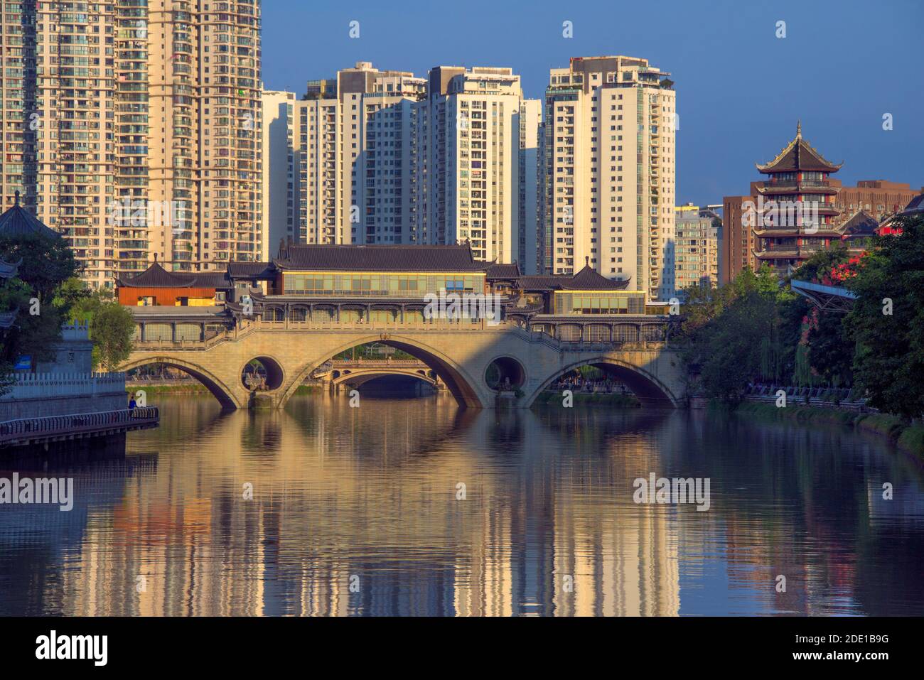 Anshun Bridge across the Jin River with modern high rises, Chengdu ...