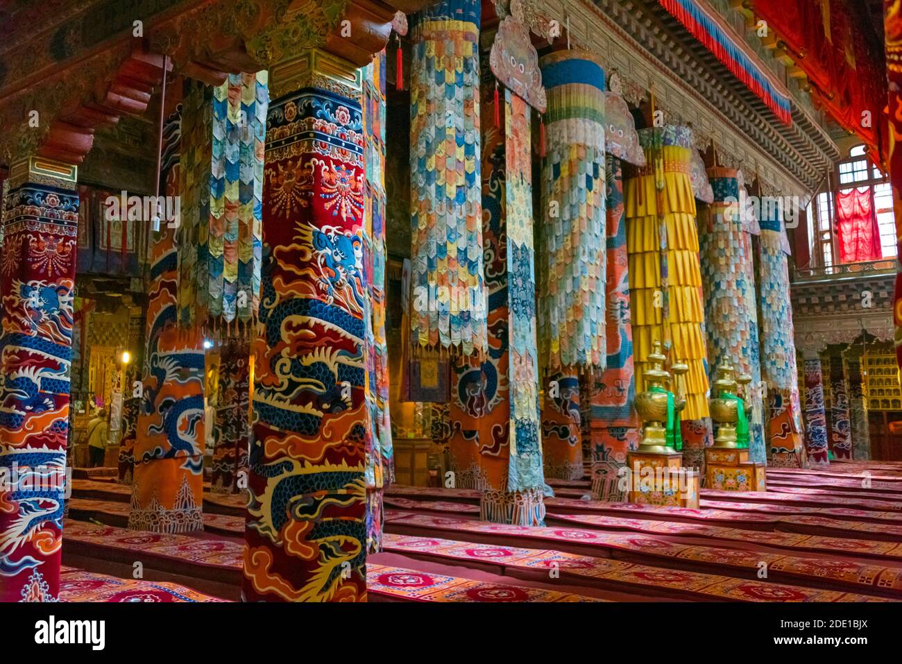 Inside a praying hall in Drepung Monastery, one of the great three ...
