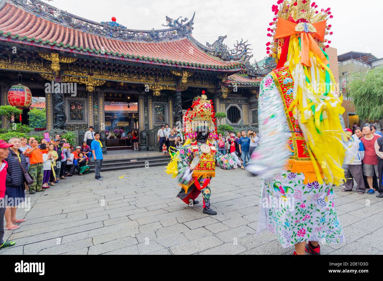 A religious parade during the Bao Sheng Cultural Festival that ...