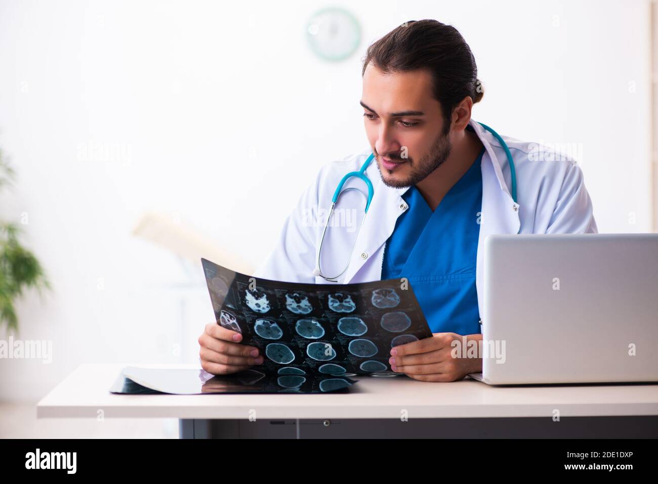 Young doctor radiologist working in the clinic Stock Photo - Alamy