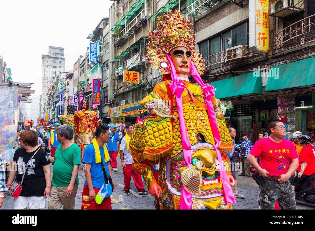 A religious parade during the Bao Sheng Cultural Festival that ...
