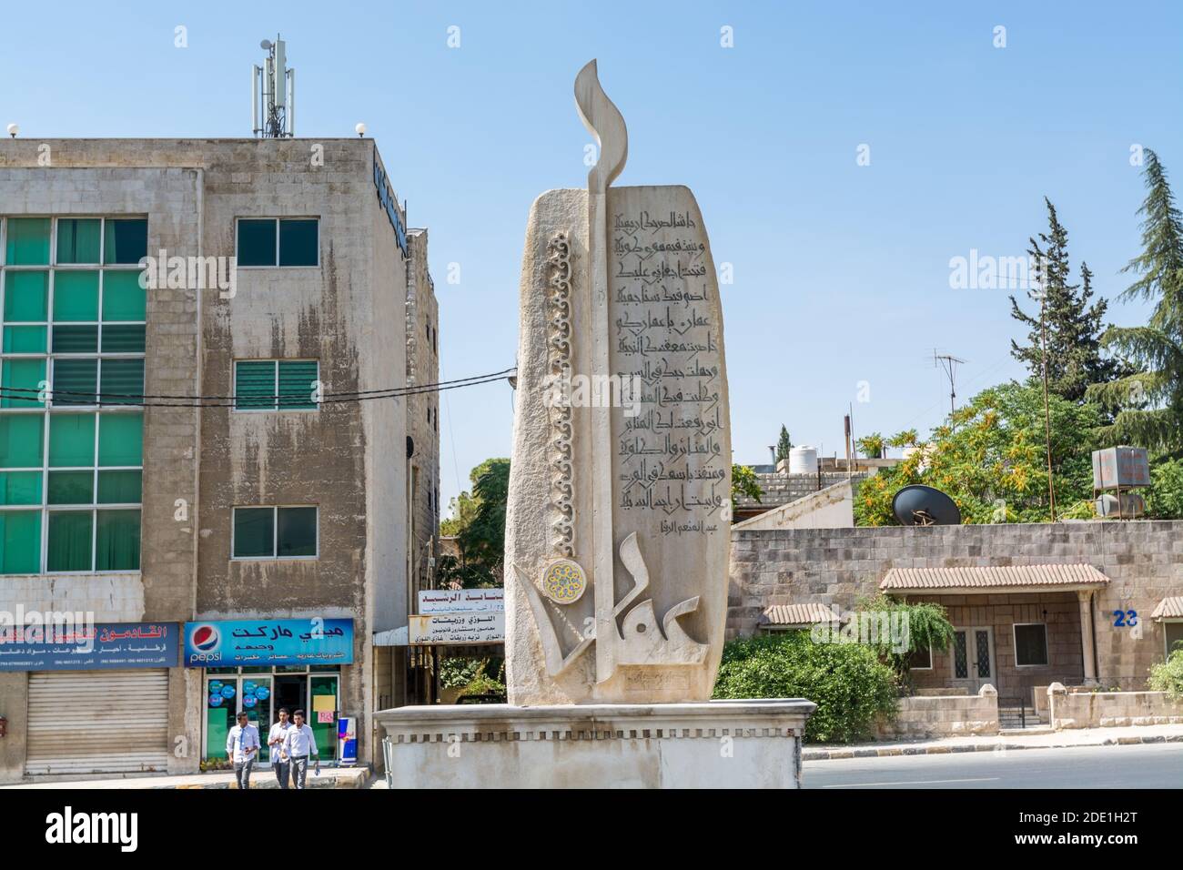 A stone statue next to the King Abdullah Mosque in Amman, Jordan Stock ...