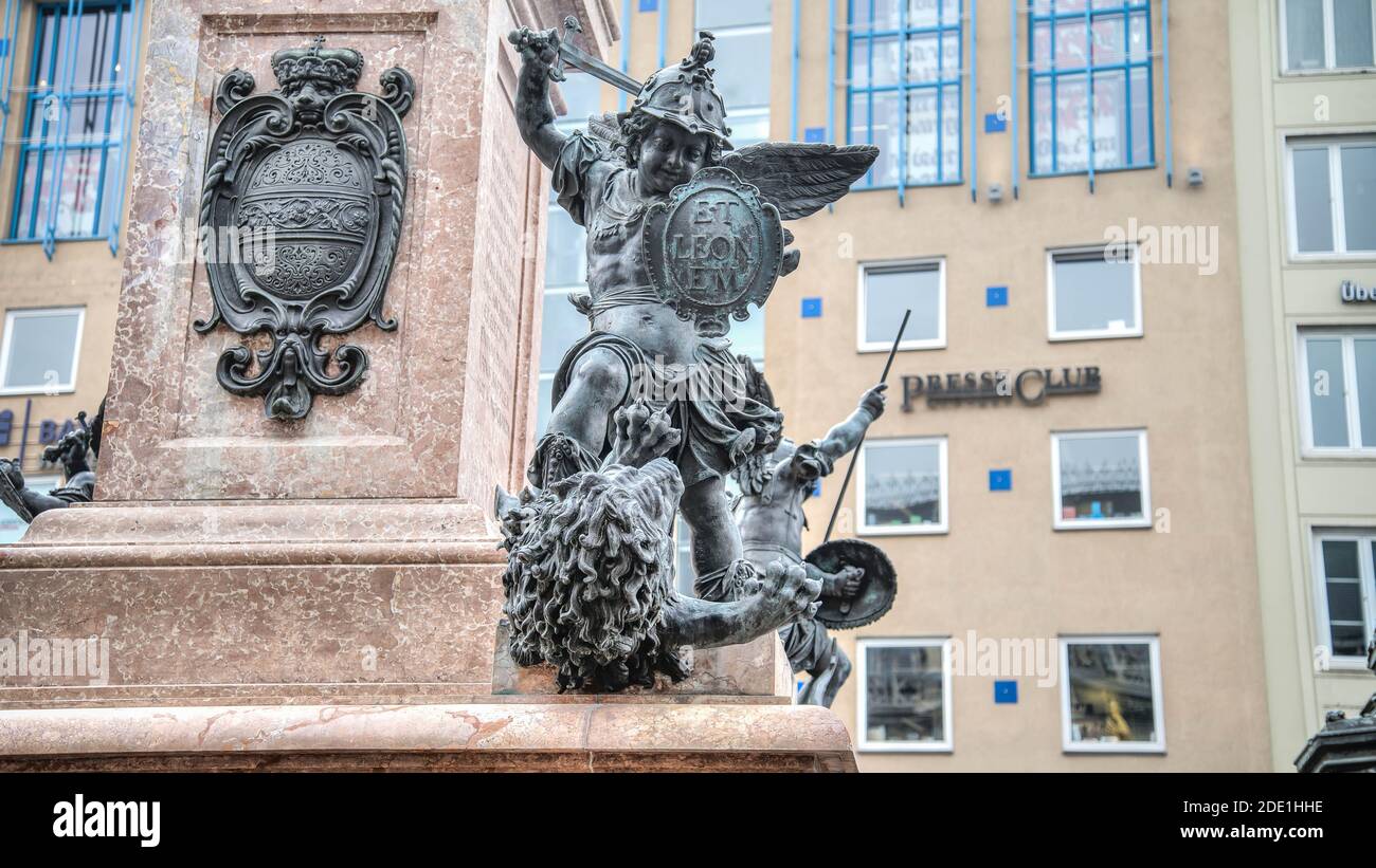 Munich, Germany - April 2014: Statue in Munich Marienplatz square with ...