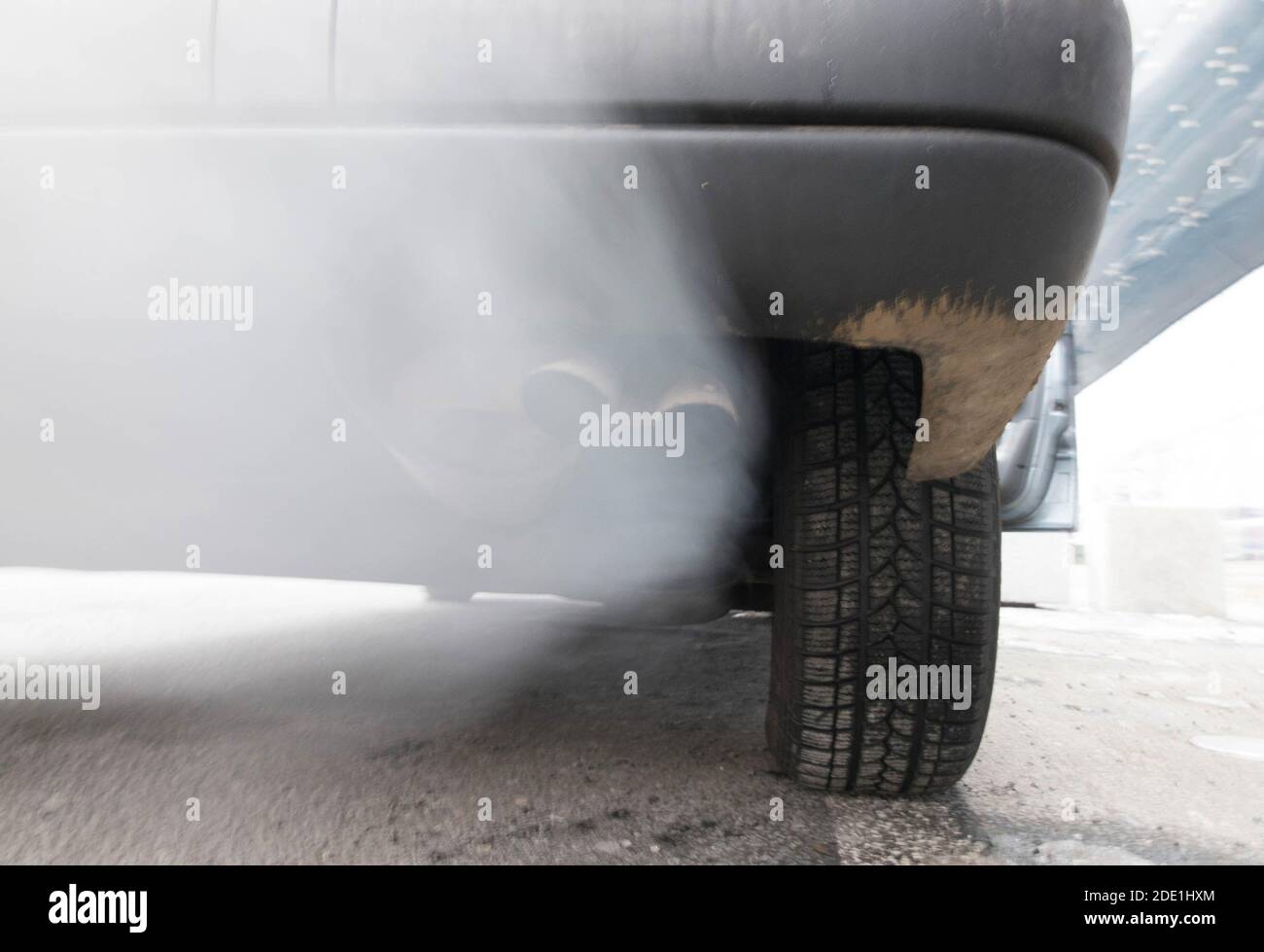 Air pollution and particulates caused by car exhaust gases, cloud of ...