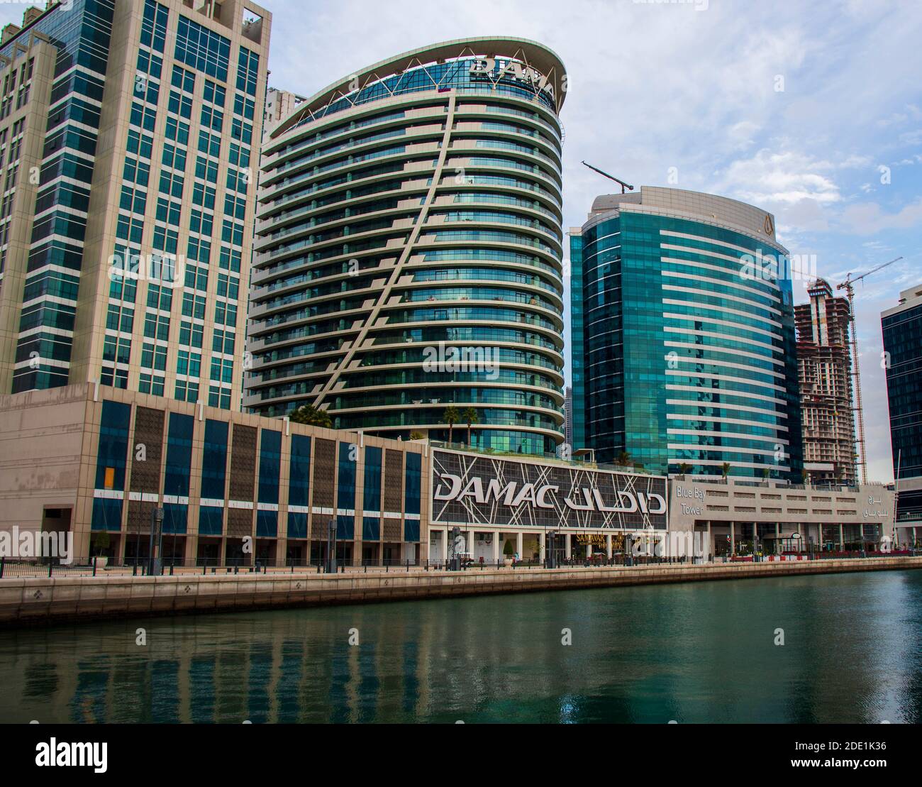 Modern buildings along the Dubai water canal, business bay district ...