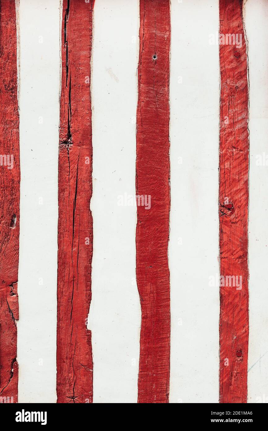 Wood and stone wall backdrop with red wooden beams Stock Photo - Alamy