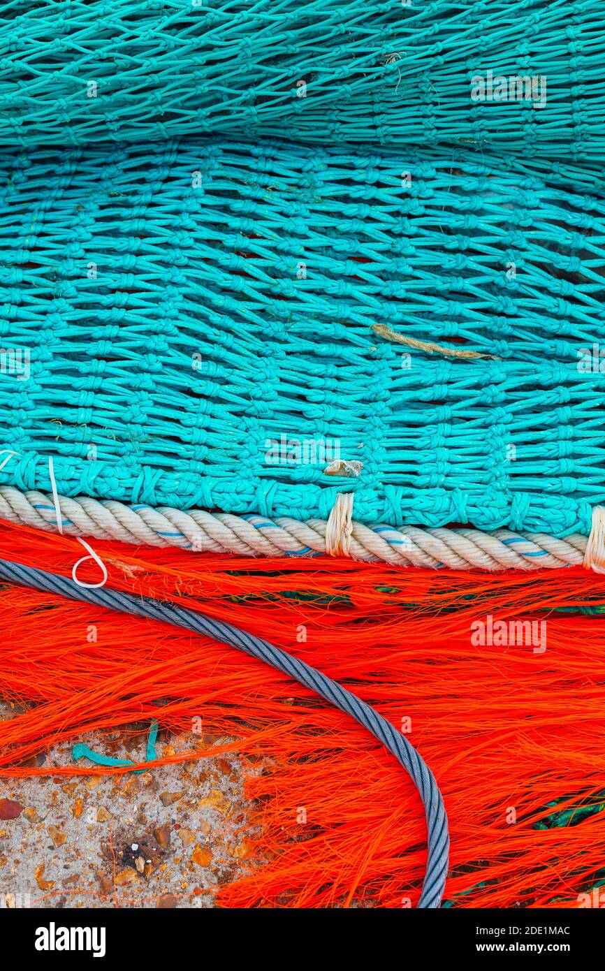 turquoise blue and orange fishing net Stock Photo - Alamy