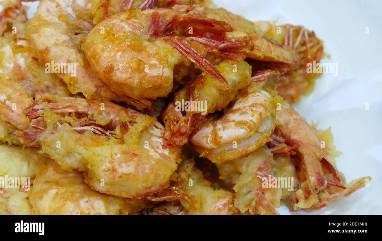 Chinese style fried prawns, with the shells still attached Stock Photo ...