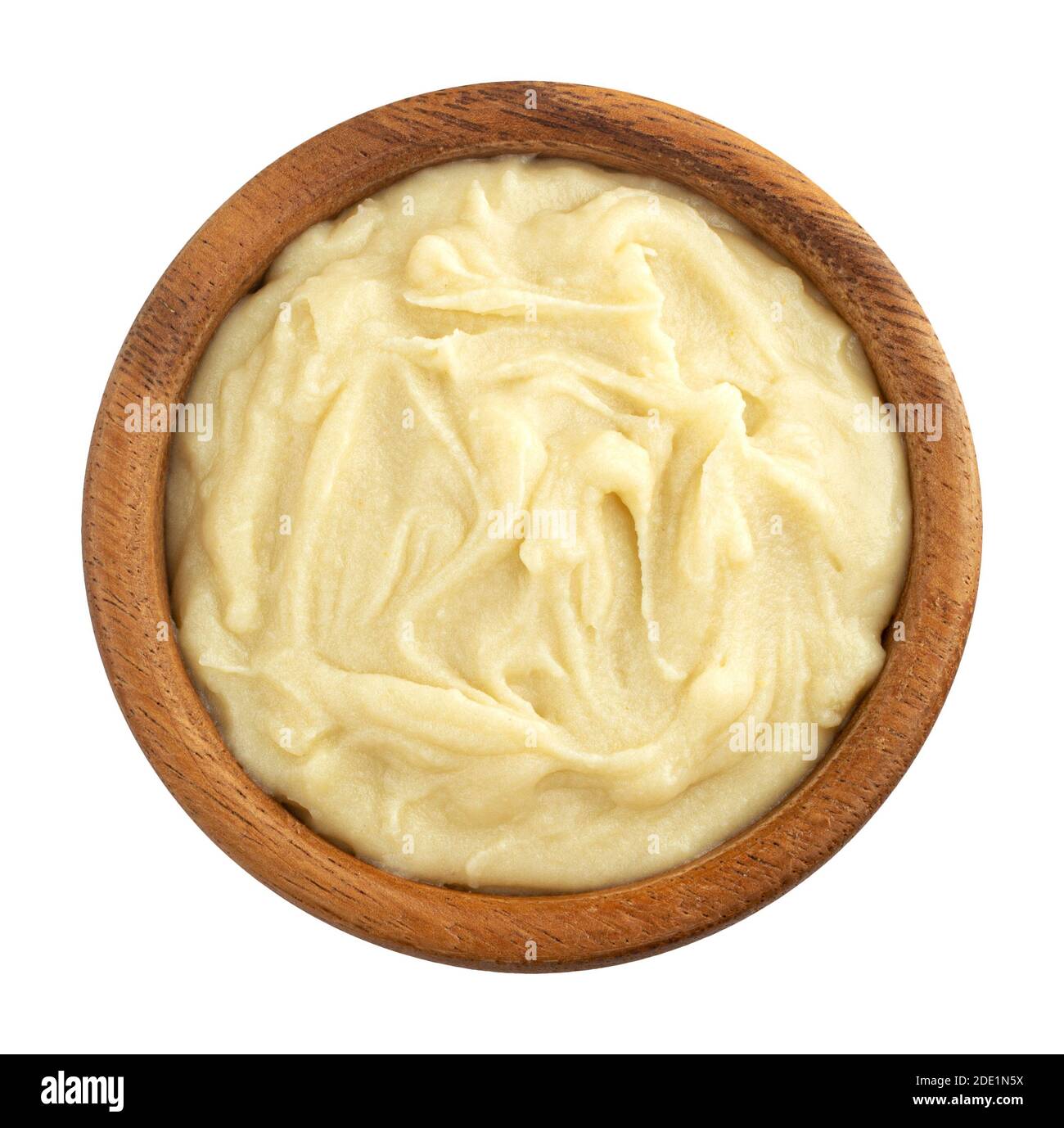 Mashed potato puree in wooden bowl isolated on white background, top ...