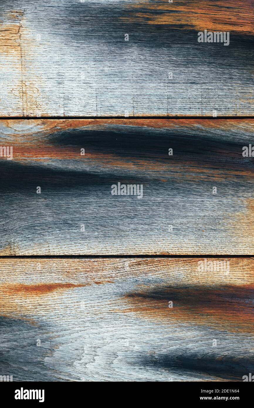 Old rusty wood panel with blue and orange colors Stock Photo - Alamy