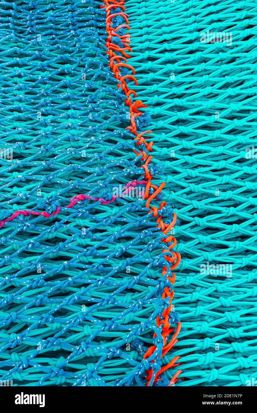 turquoise blue fishing net Stock Photo - Alamy