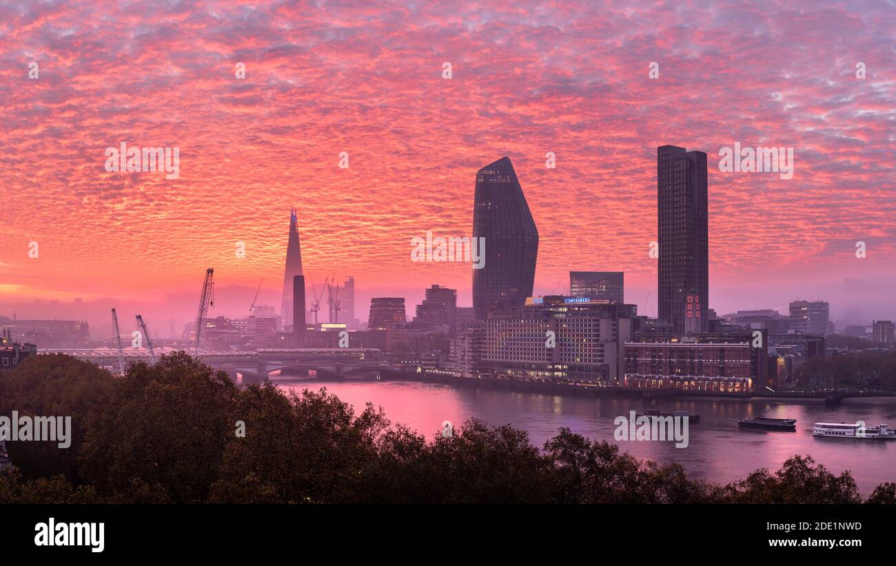 Epic sunrise over London city skyline with stunning sky formations over ...
