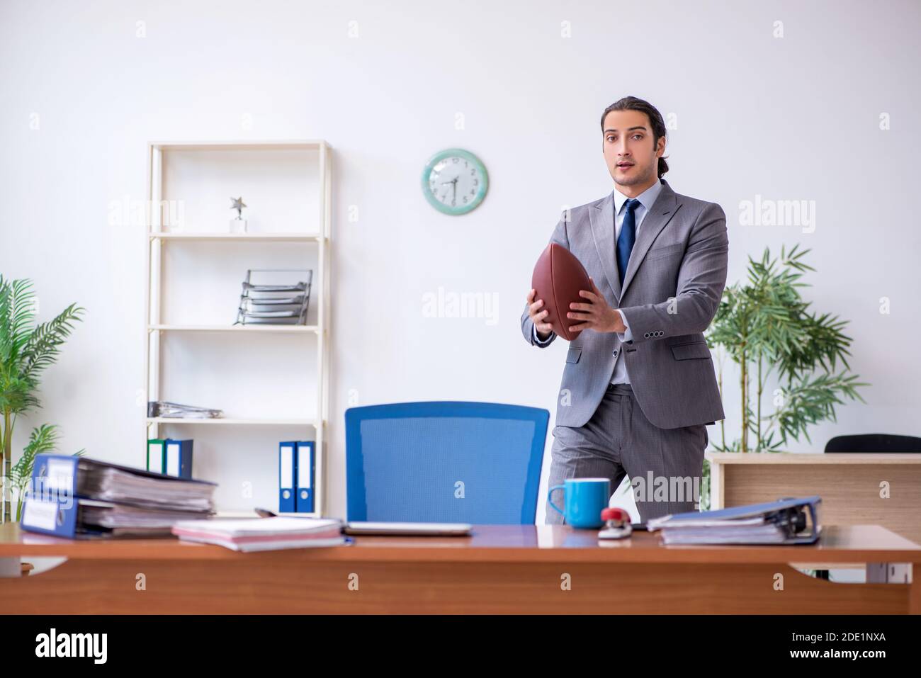Successful male athlete throwing ball hi-res stock photography and ...