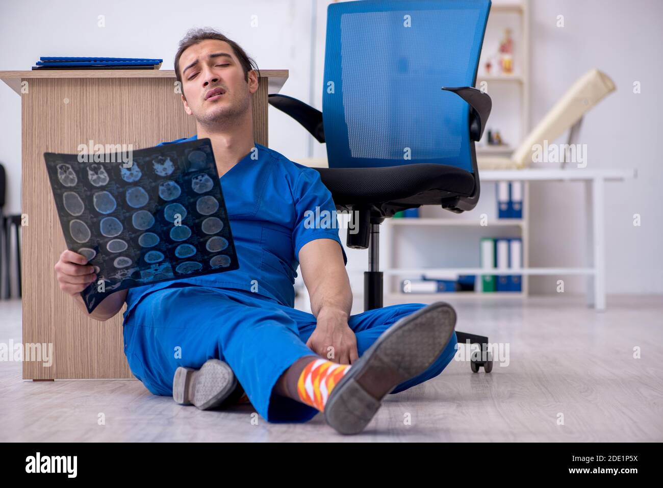 Young doctor radiologist being unhappy after night shift Stock Photo ...