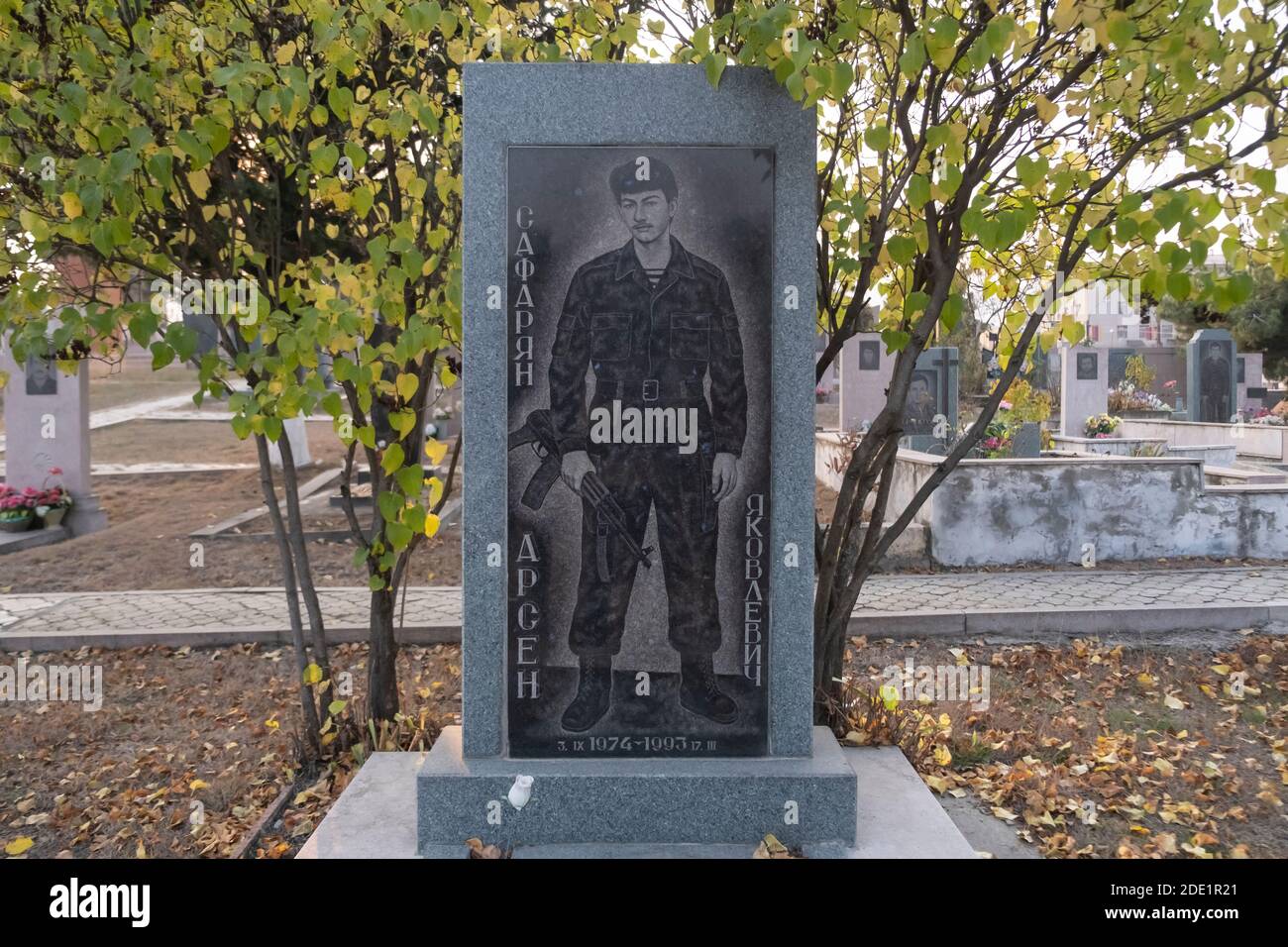 An etched headstone marks the grave of a soldier of the Artsakh Defence ...