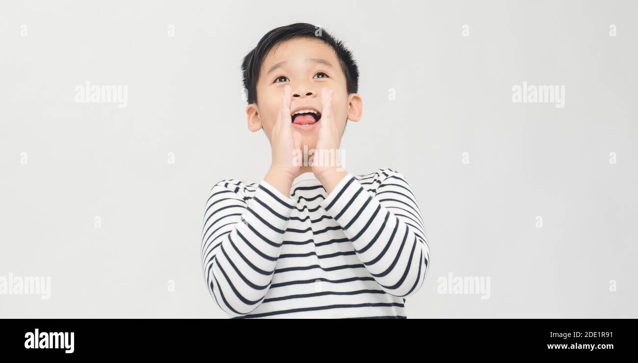A very cute young surprised boy Isolated on white Stock Photo - Alamy