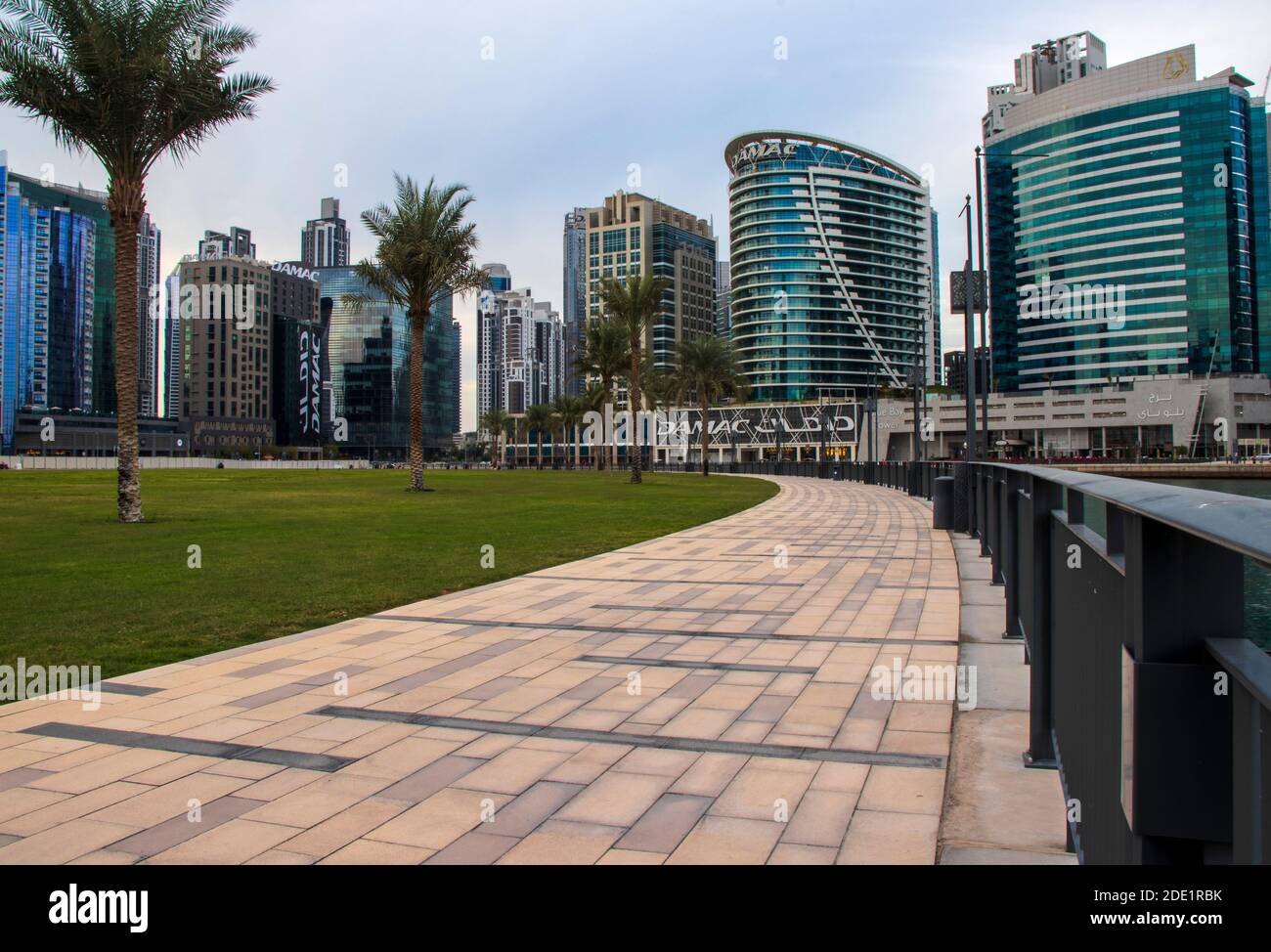 Modern buildings along the Dubai water canal, business bay district UAE ...