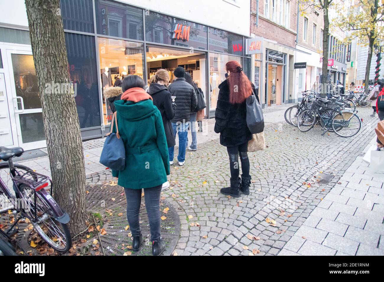 Queues form in front of the shops in the shopping streets, on November ...