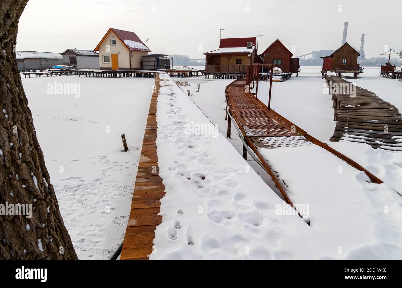 View of the famous floating village at wintertime.Frozen lake, snowy ...