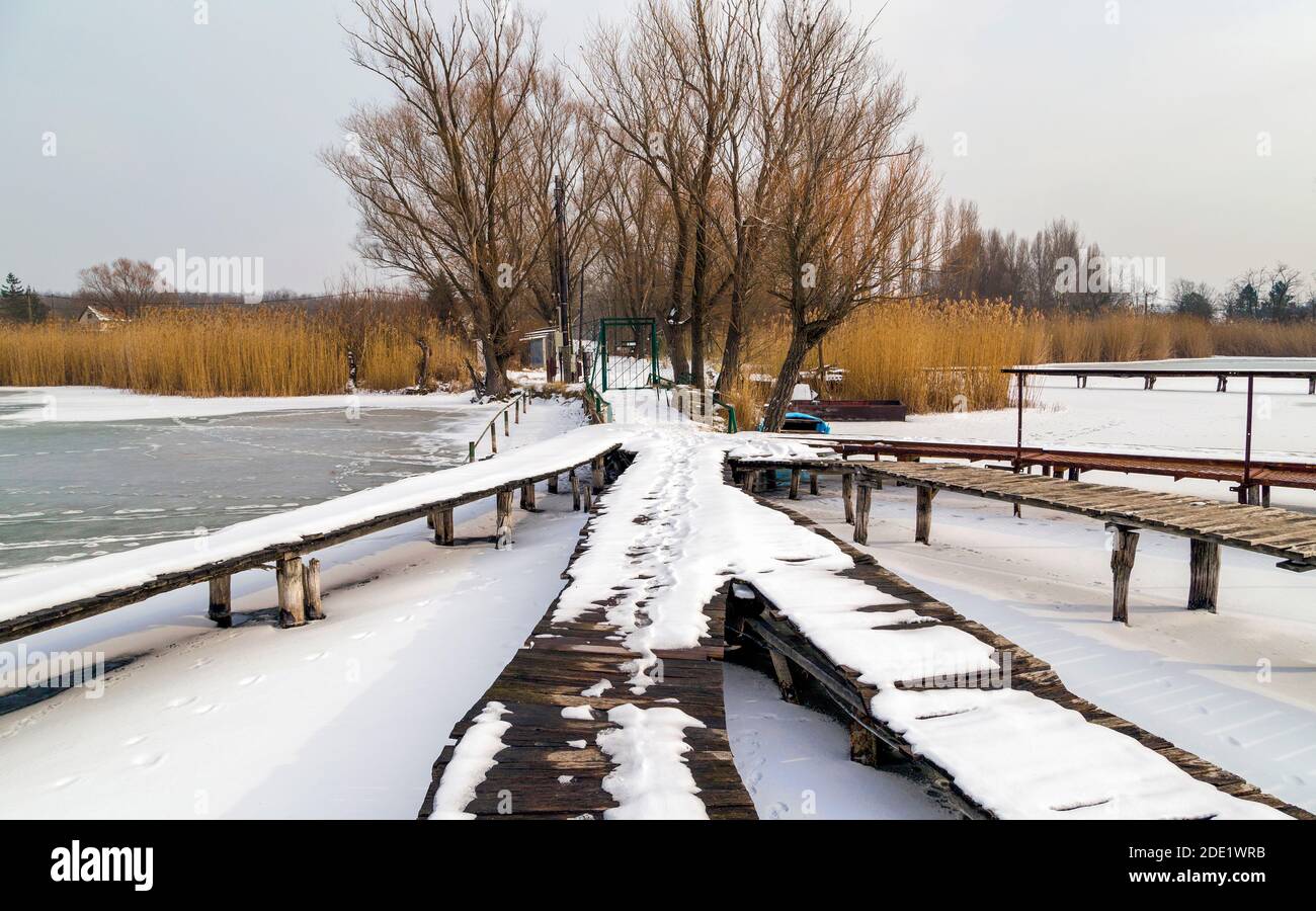 View of the famous floating village at wintertime.Frozen lake, snowy ...
